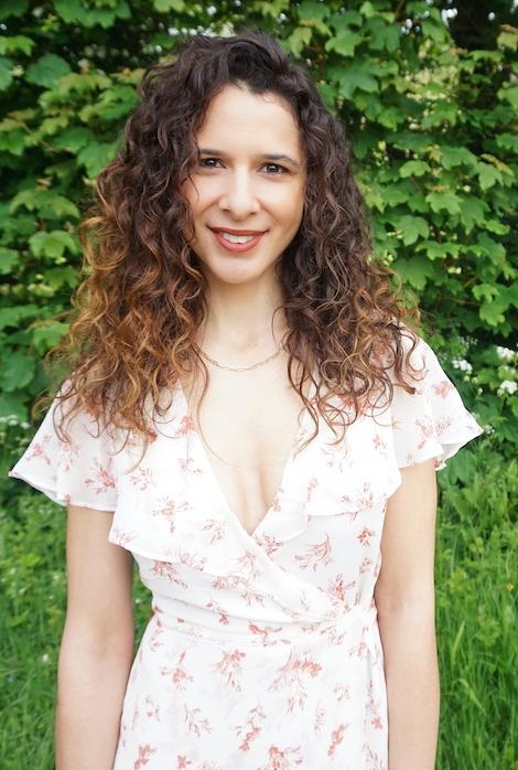 Sandra standing in front of long grass